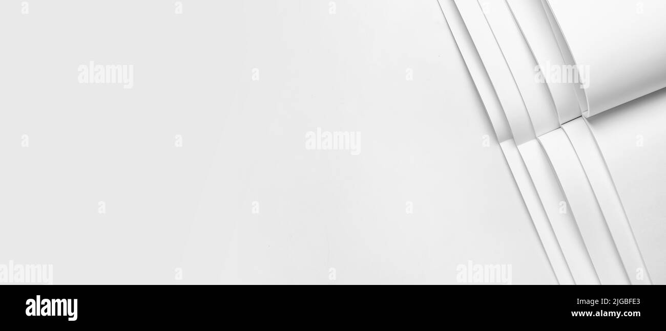 Open magazines with blank pages on white background with space for text ...