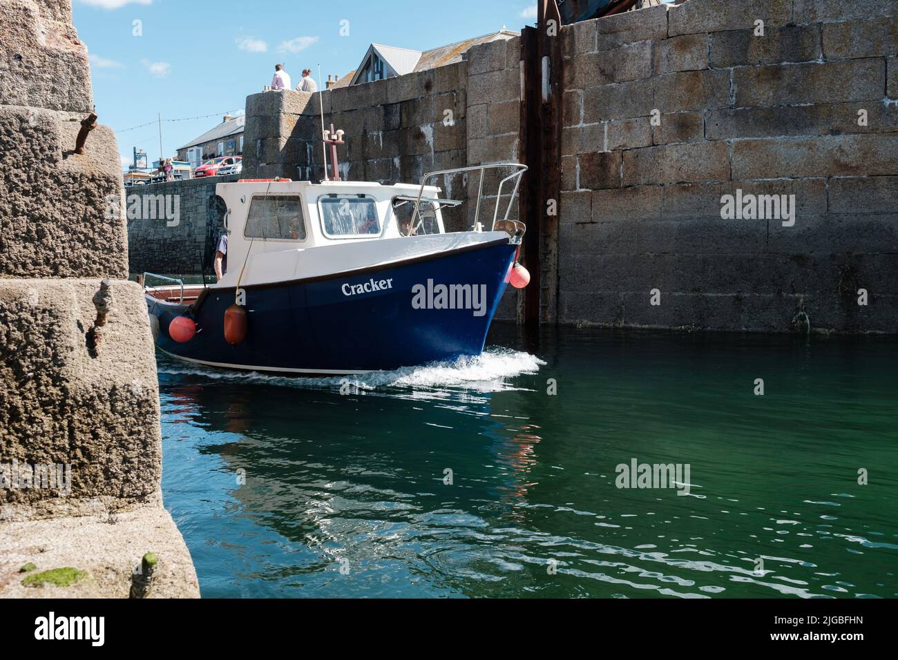 Boats leaving Porthleven Harbour, Cornwall Stock Photo - Alamy