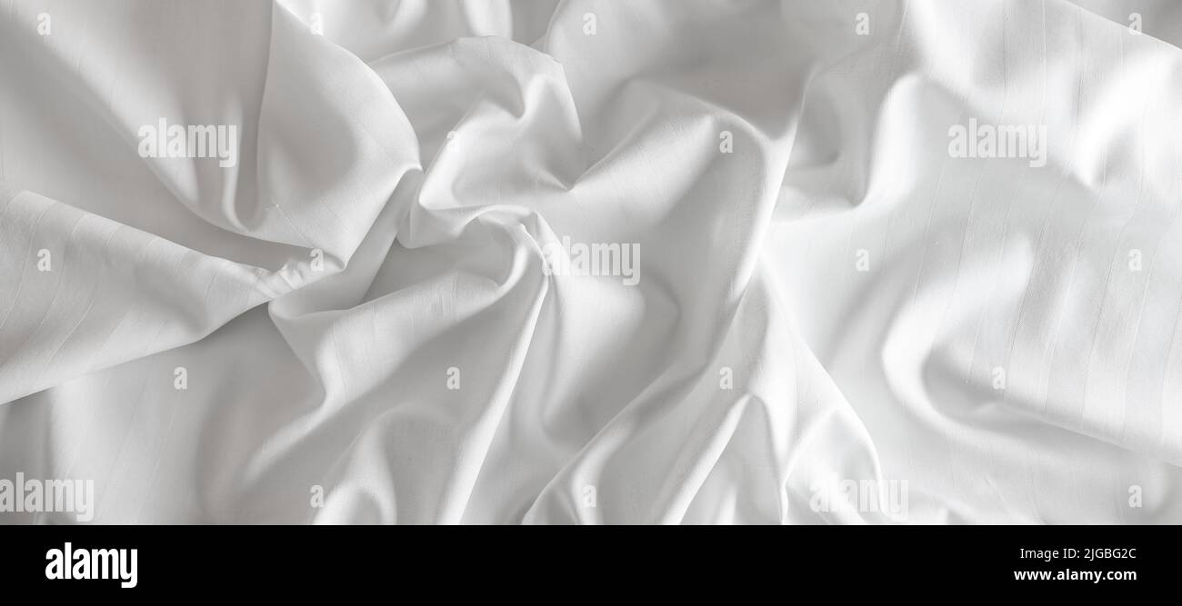 White crumpled bed sheet as background Stock Photo - Alamy