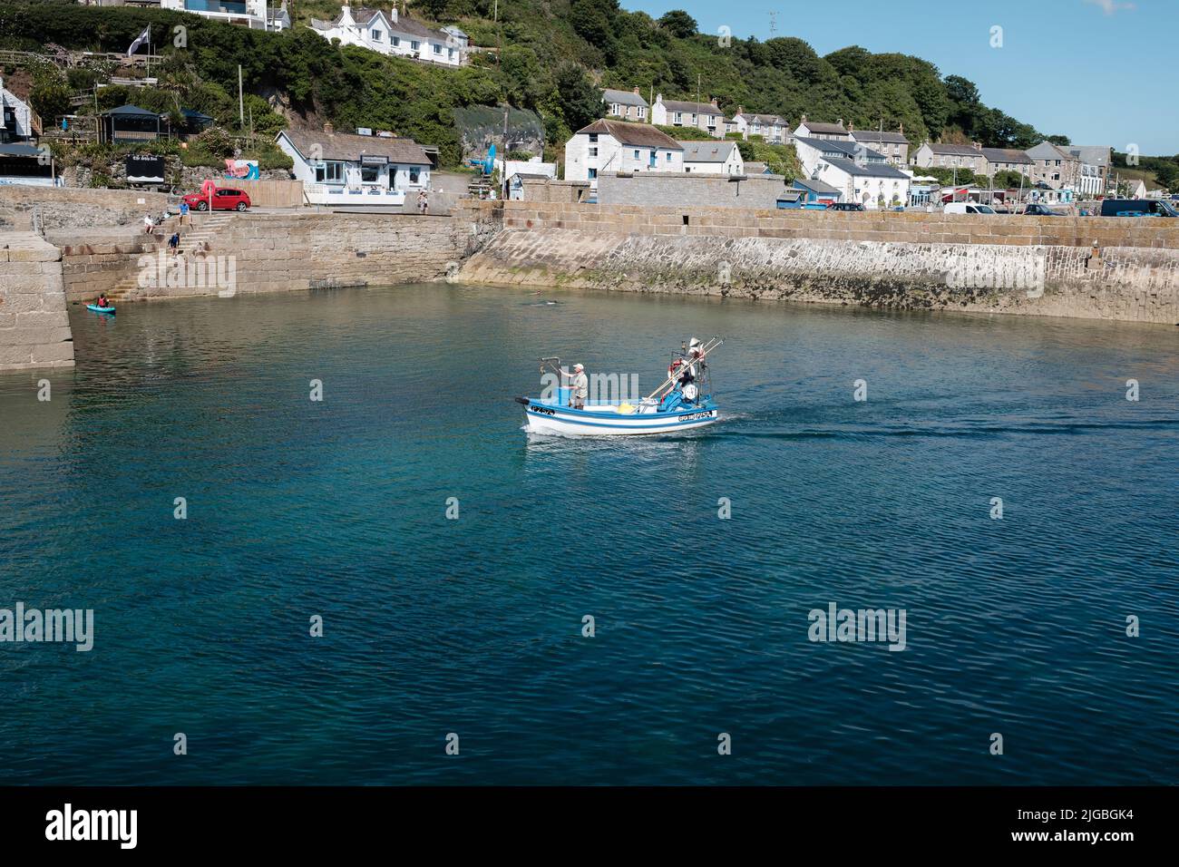 Boats leaving Porthleven Harbour, Cornwall Stock Photo - Alamy