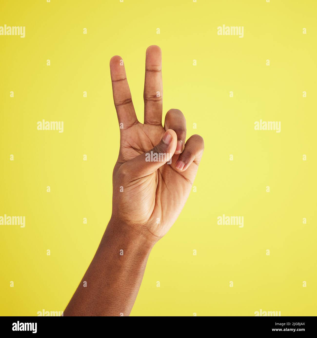 Man making peace sign hi-res stock photography and images - Alamy