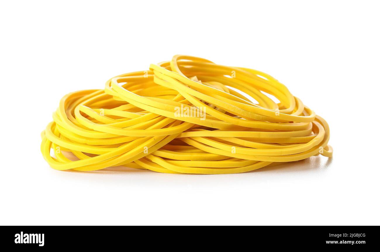 Heap of yellow rubber bands isolated on white background Stock Photo ...