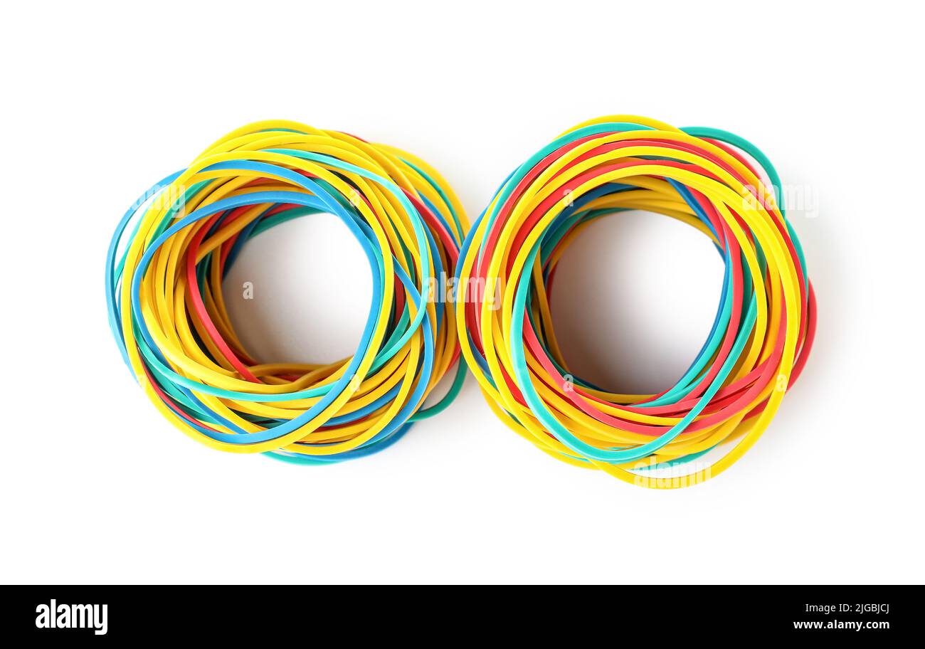 Two stacks of colorful rubber bands on white background Stock Photo - Alamy