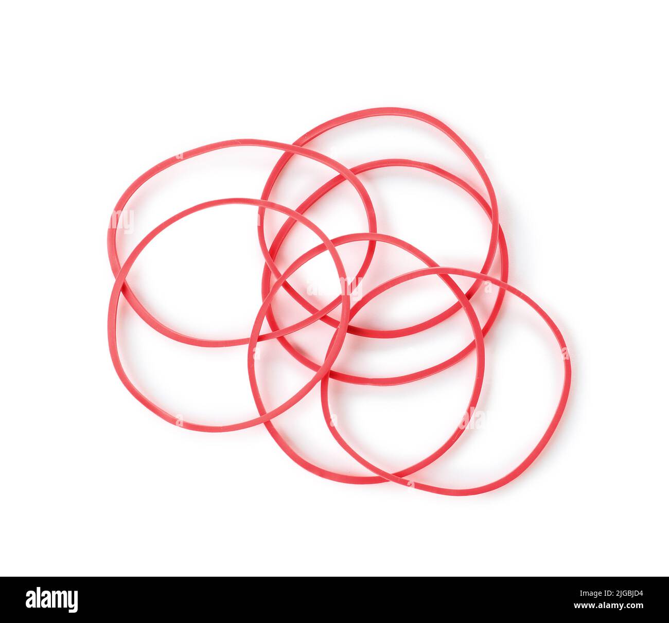 Red rubber bands on white background Stock Photo - Alamy