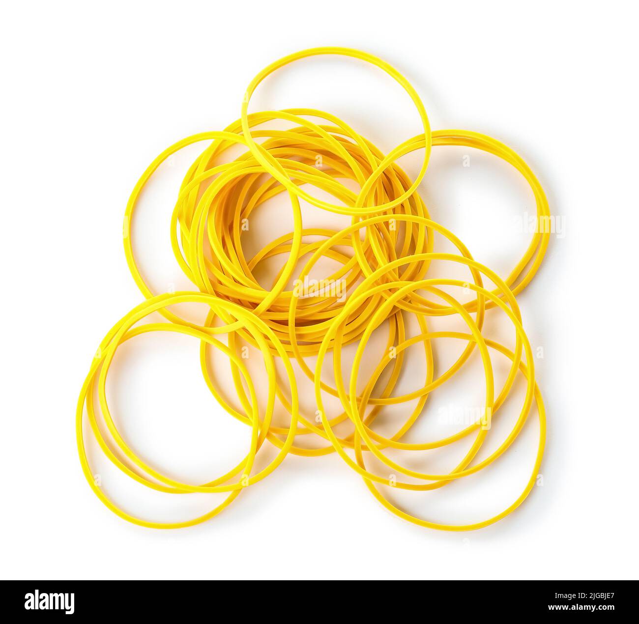 Heap of yellow rubber bands isolated on white background Stock Photo ...