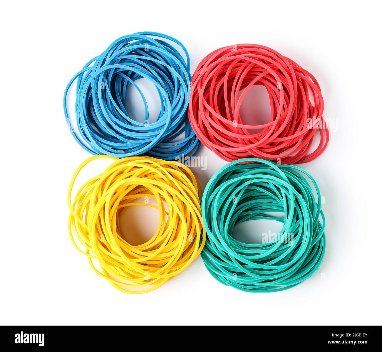 Stacks of different rubber bands on white background Stock Photo - Alamy