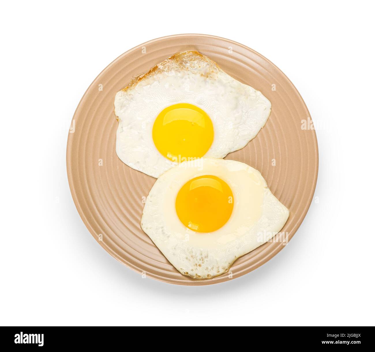 Plate with tasty fried eggs isolated on white background Stock Photo - Alamy