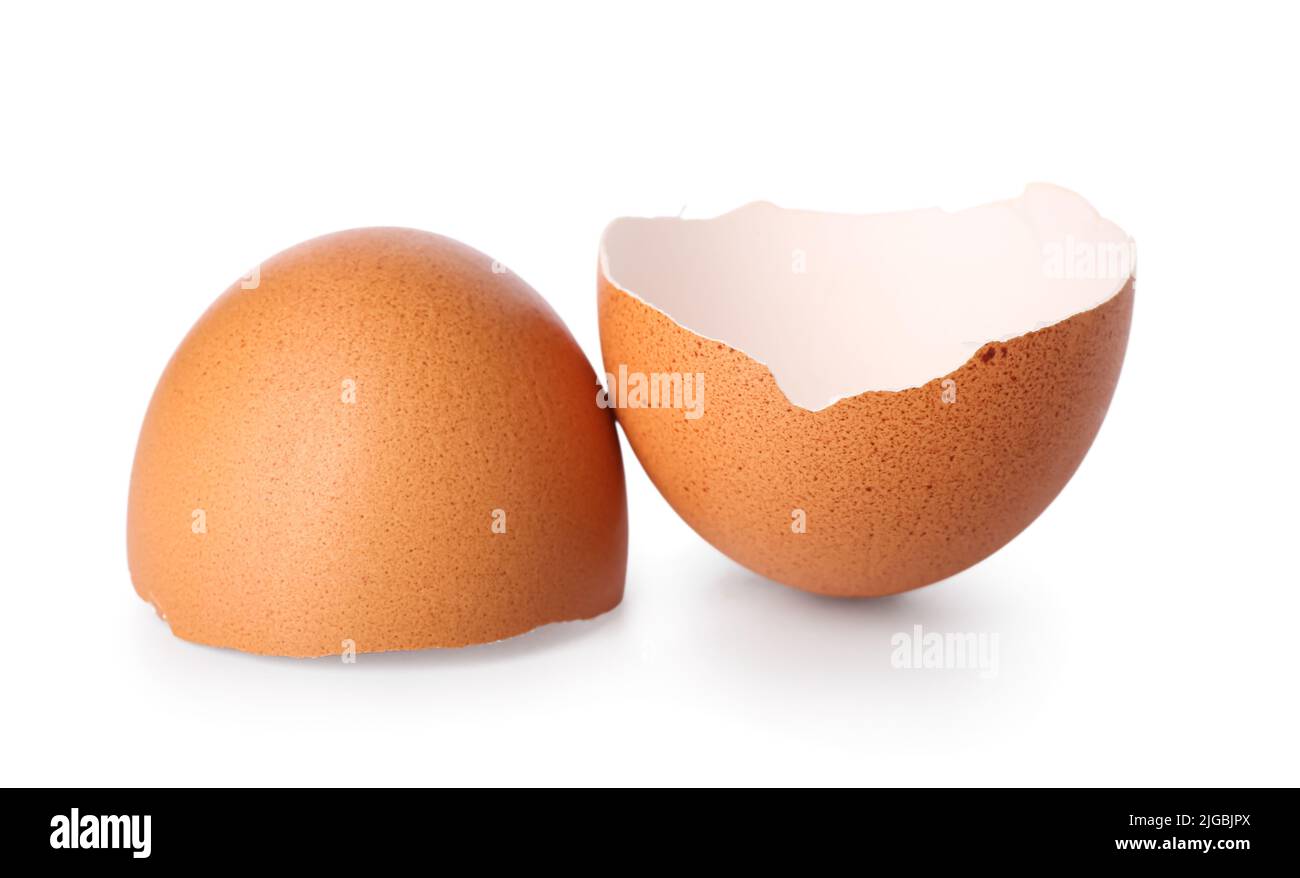 Broken egg shell on white background Stock Photo - Alamy