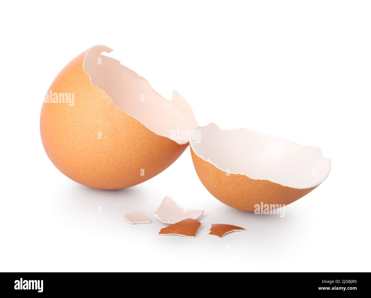 Broken egg shell on white background Stock Photo - Alamy