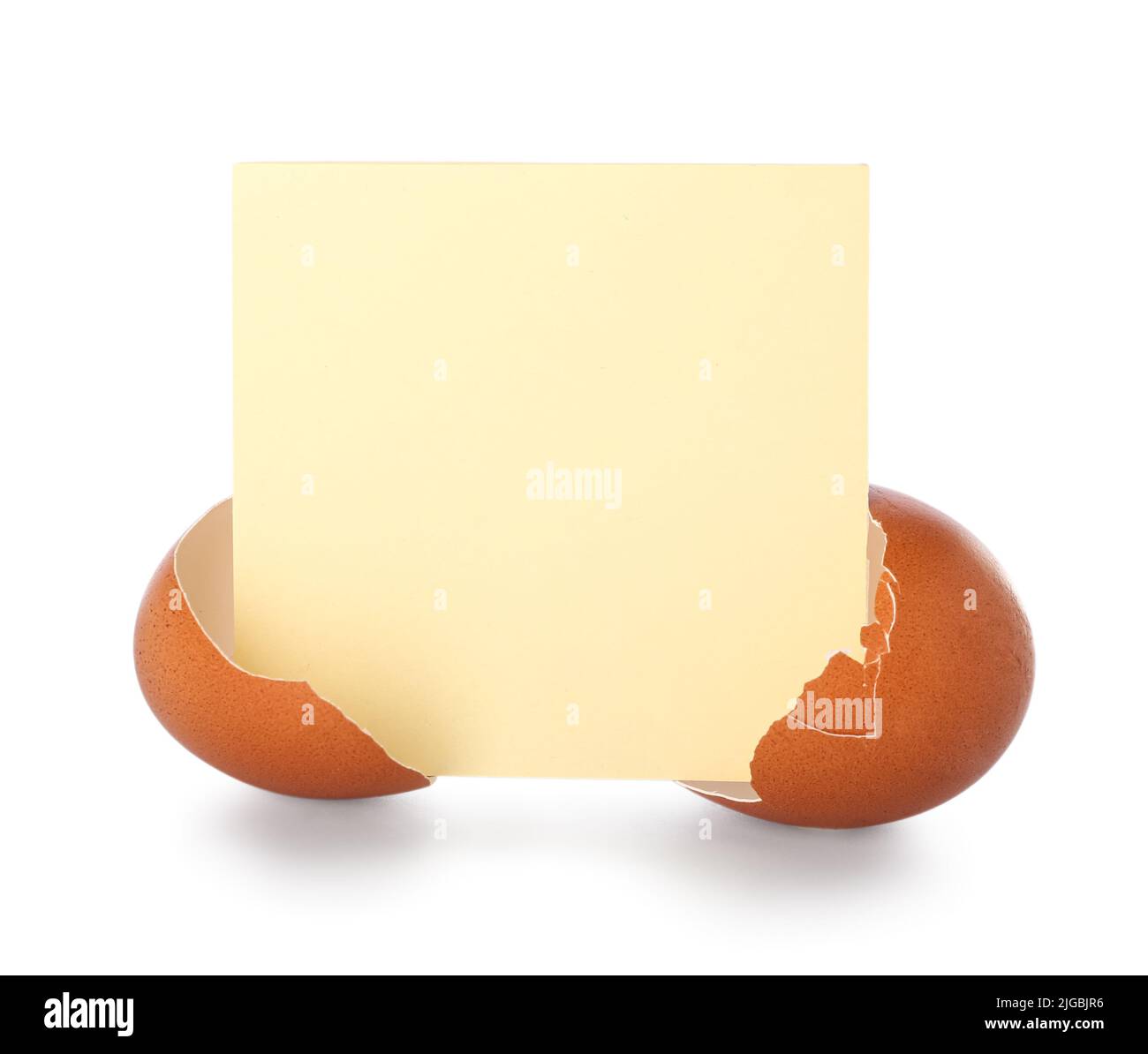 Blank paper sheet with broken egg shell on white background Stock Photo ...