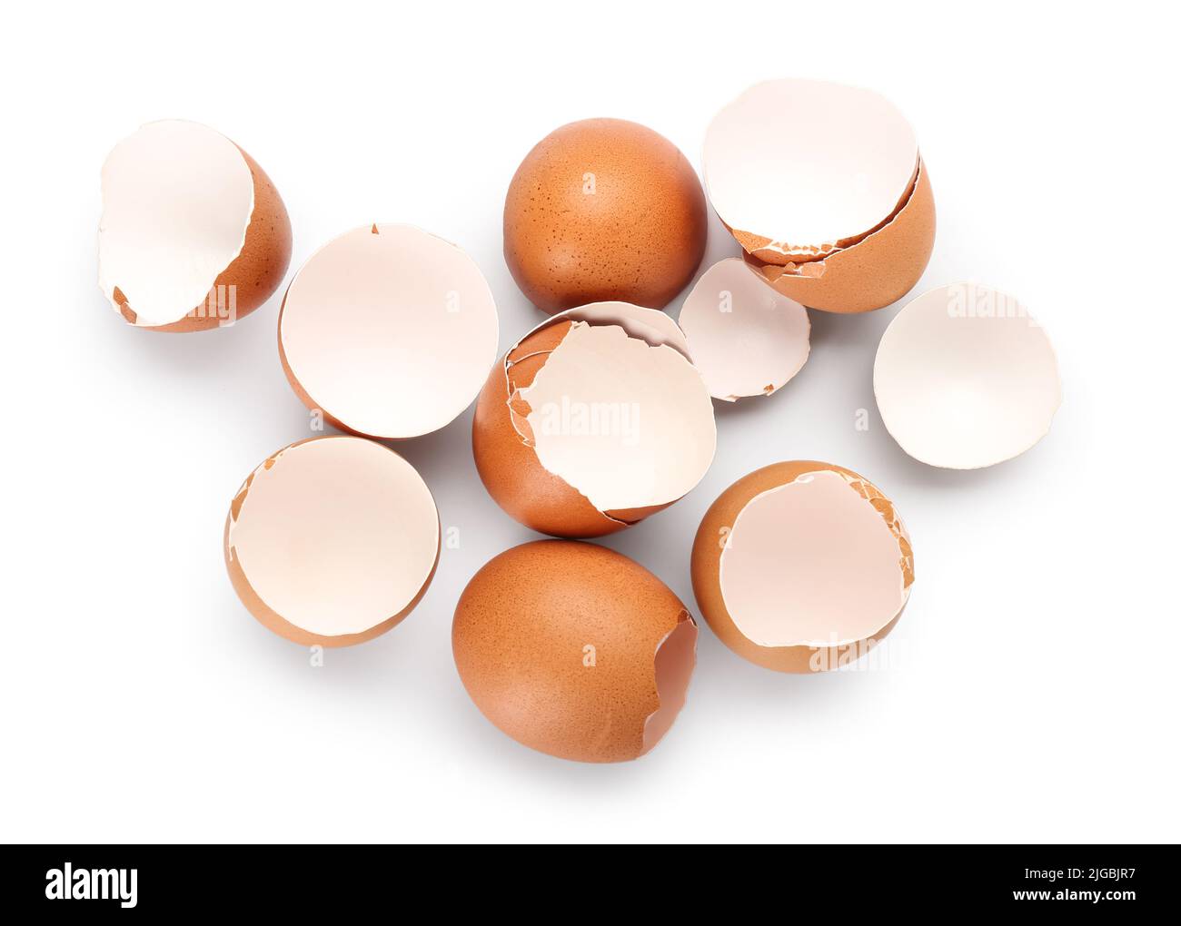 Heap of egg shells on white background Stock Photo - Alamy