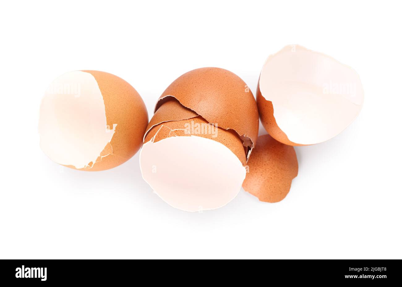 Heap of egg shells on white background Stock Photo - Alamy