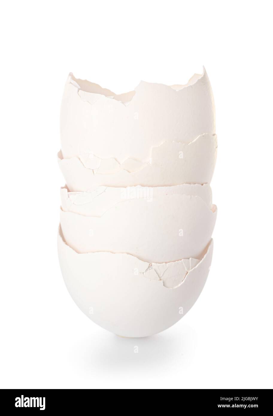 Stack of egg shells on white background Stock Photo - Alamy