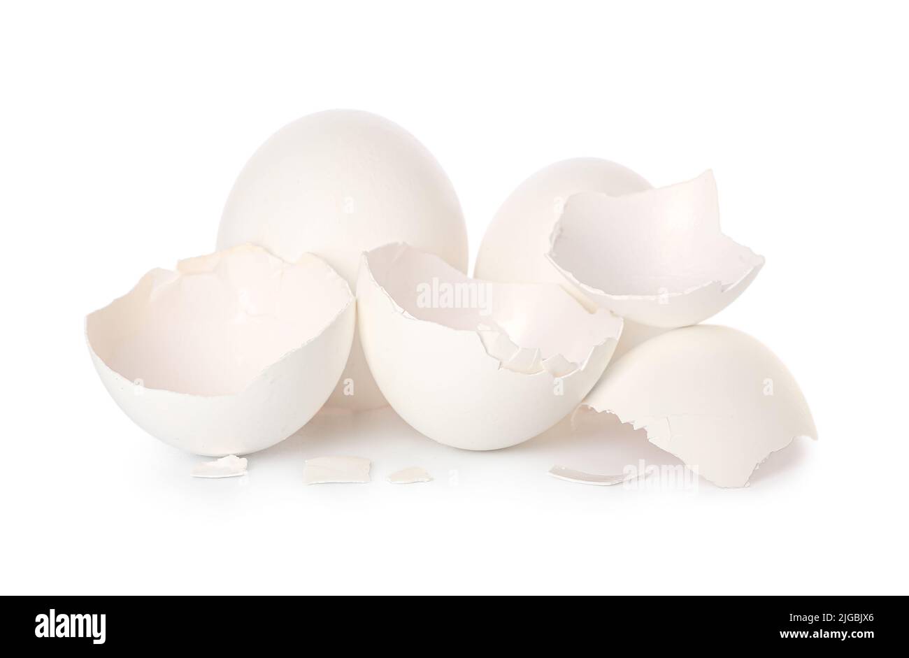 Heap of egg shells on white background Stock Photo - Alamy