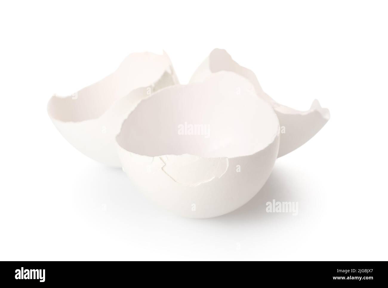 Egg shells on white background Stock Photo - Alamy