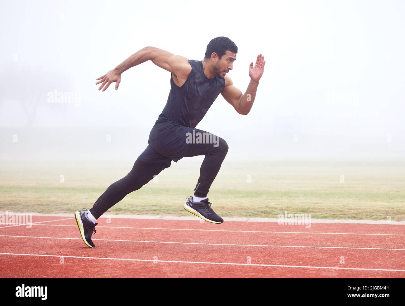Gaining some serious speed. Full length shot of a handsome young male ...