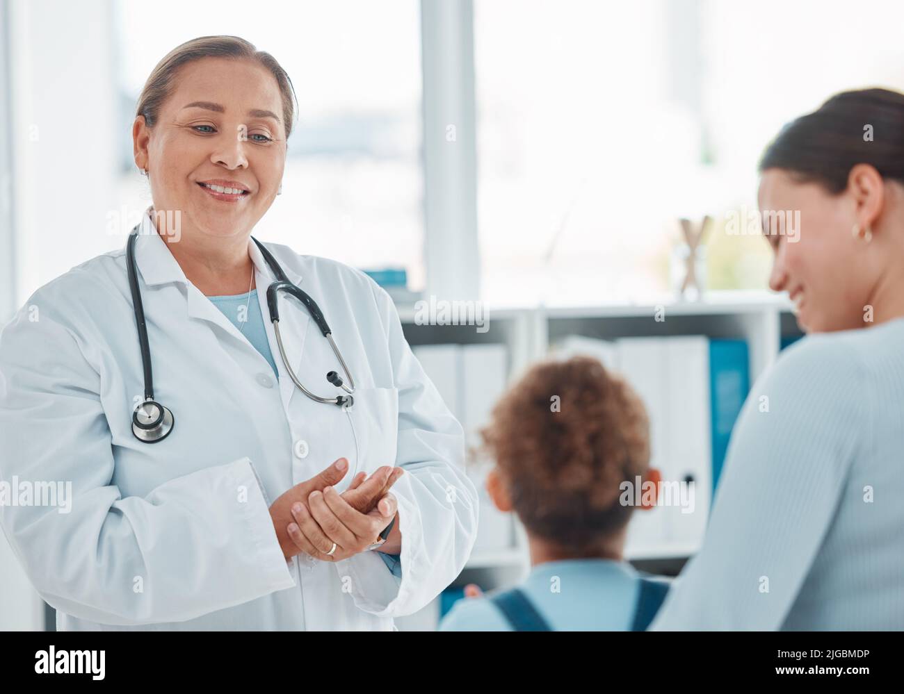 Sharing her insights for healthy childhood development. a doctor having ...