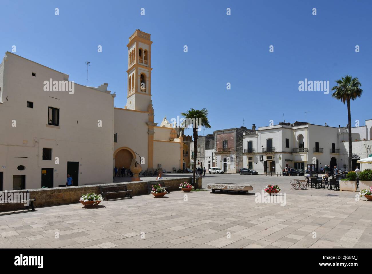 The town square of Specchia, a medieval village in the Puglia region of ...