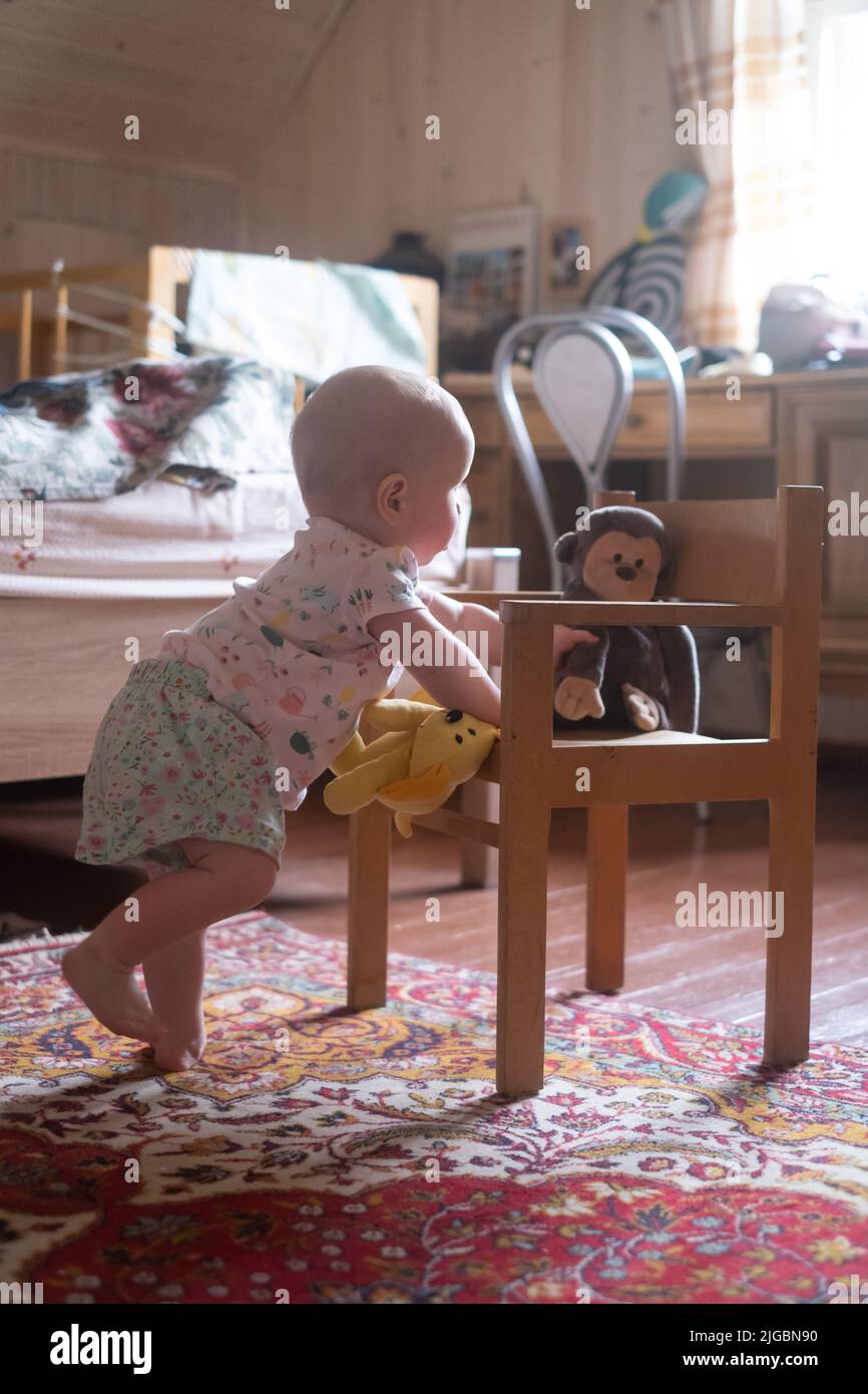 Child Standing Up From Chair