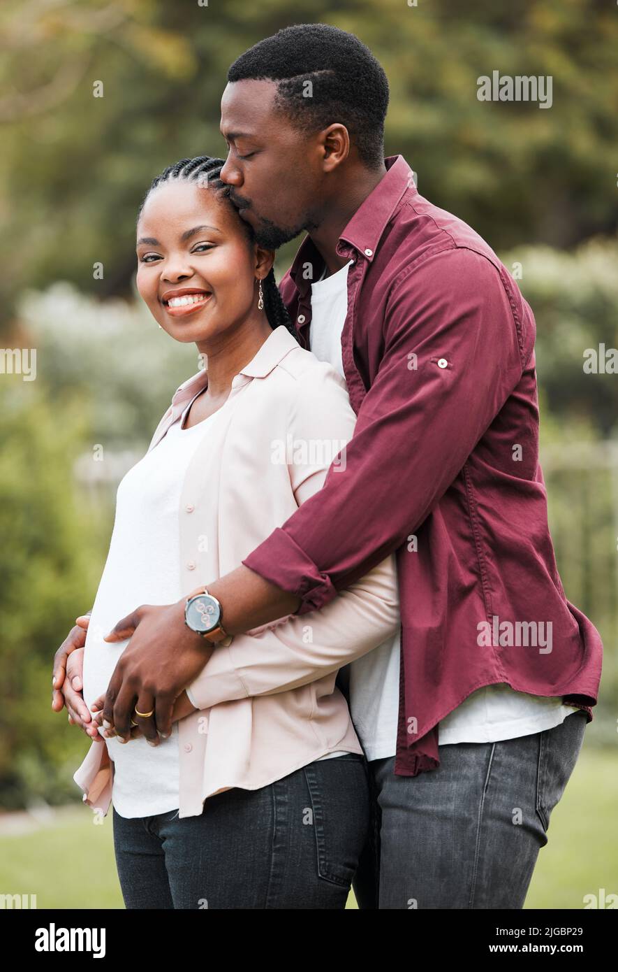 Our future looks promising. a young expecting couple posing together in ...