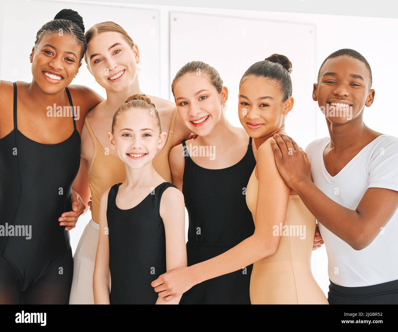 Friends forever in life and ballet. a group of young ballet dancers ...