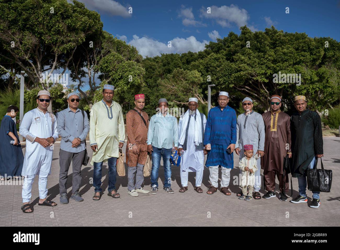 Muslims pose for a photo at Foro Italico. The Muslim communities in ...