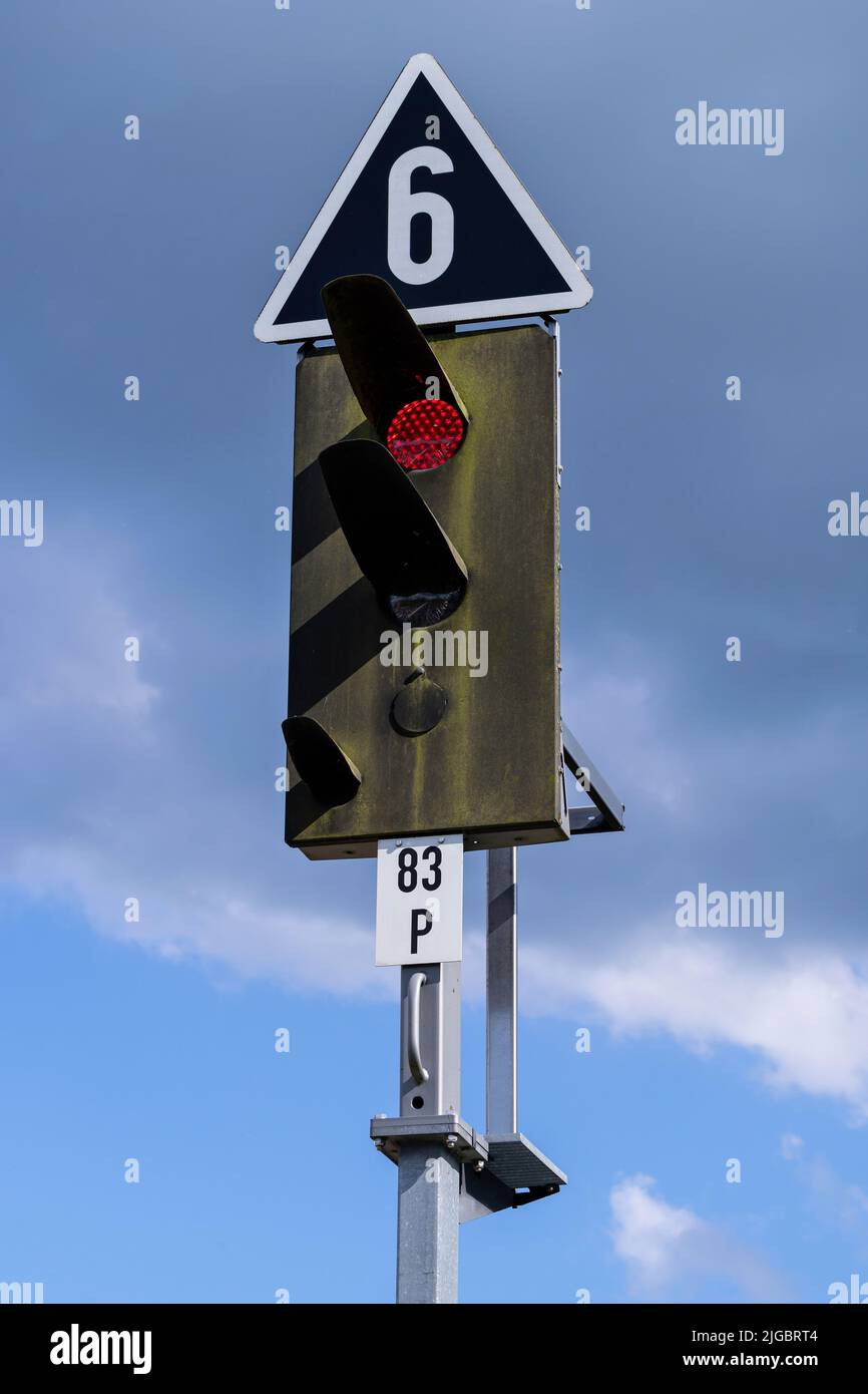 red railway signal at rail track Stock Photo - Alamy