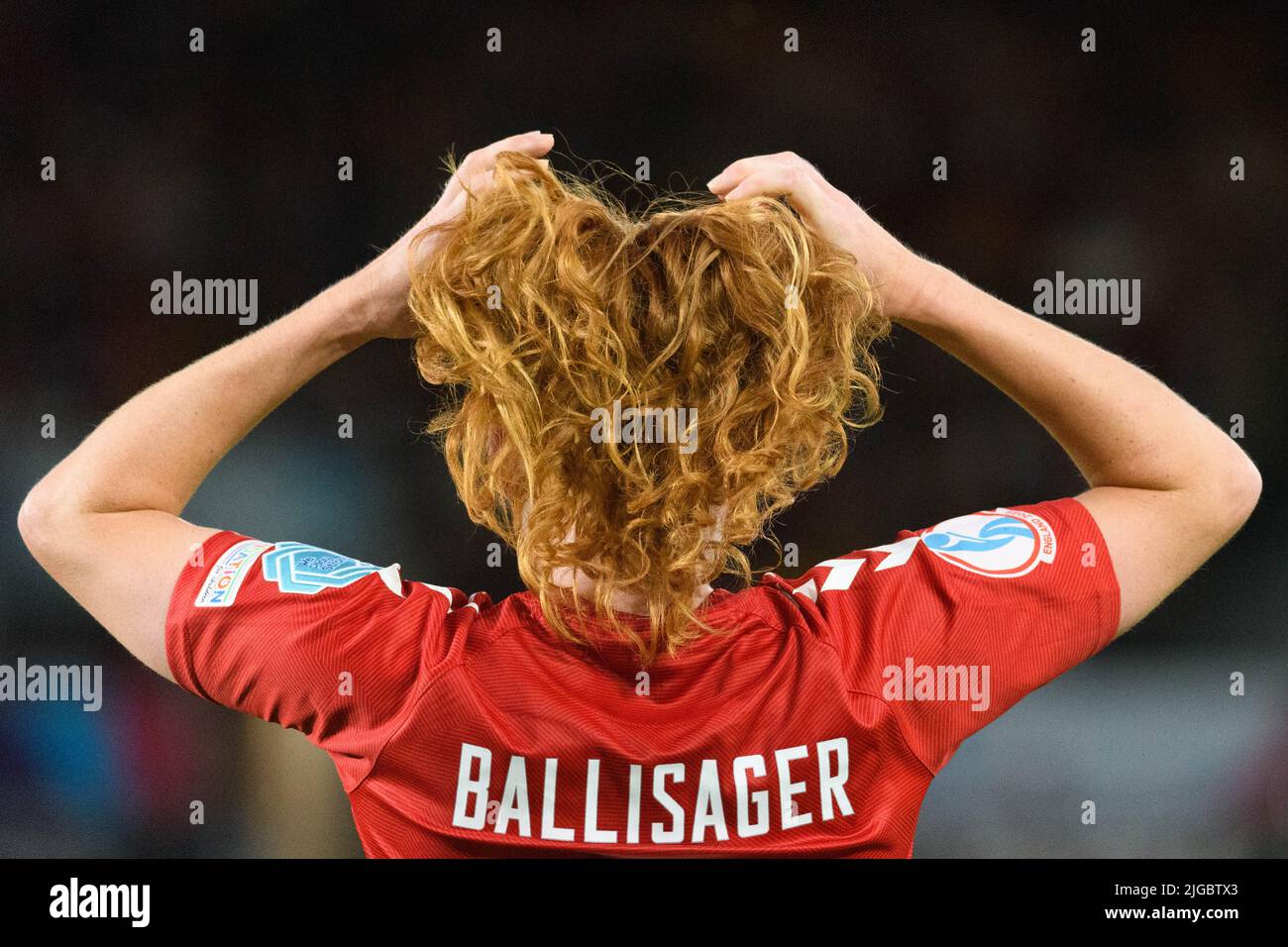 Stine Ballisager Pedersen (3 Denmark) from behind while puting her hair ...