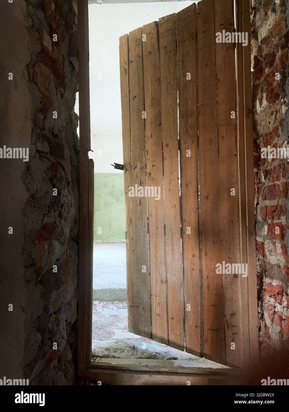 Half open door in abandoned house Stock Photo - Alamy