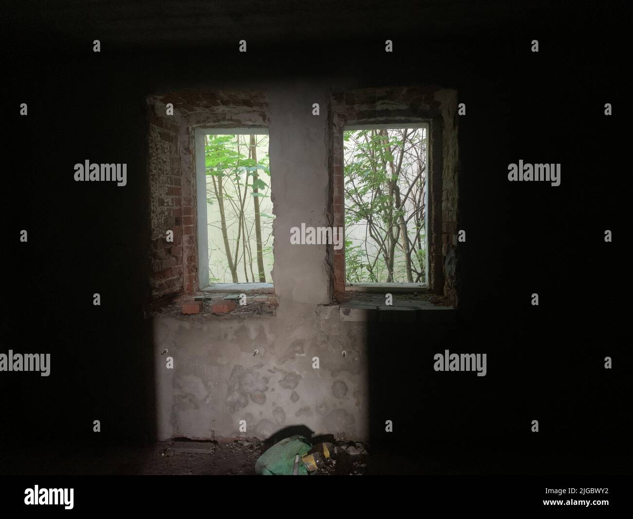 Dark room window of abandoned house with ghosts Stock Photo - Alamy