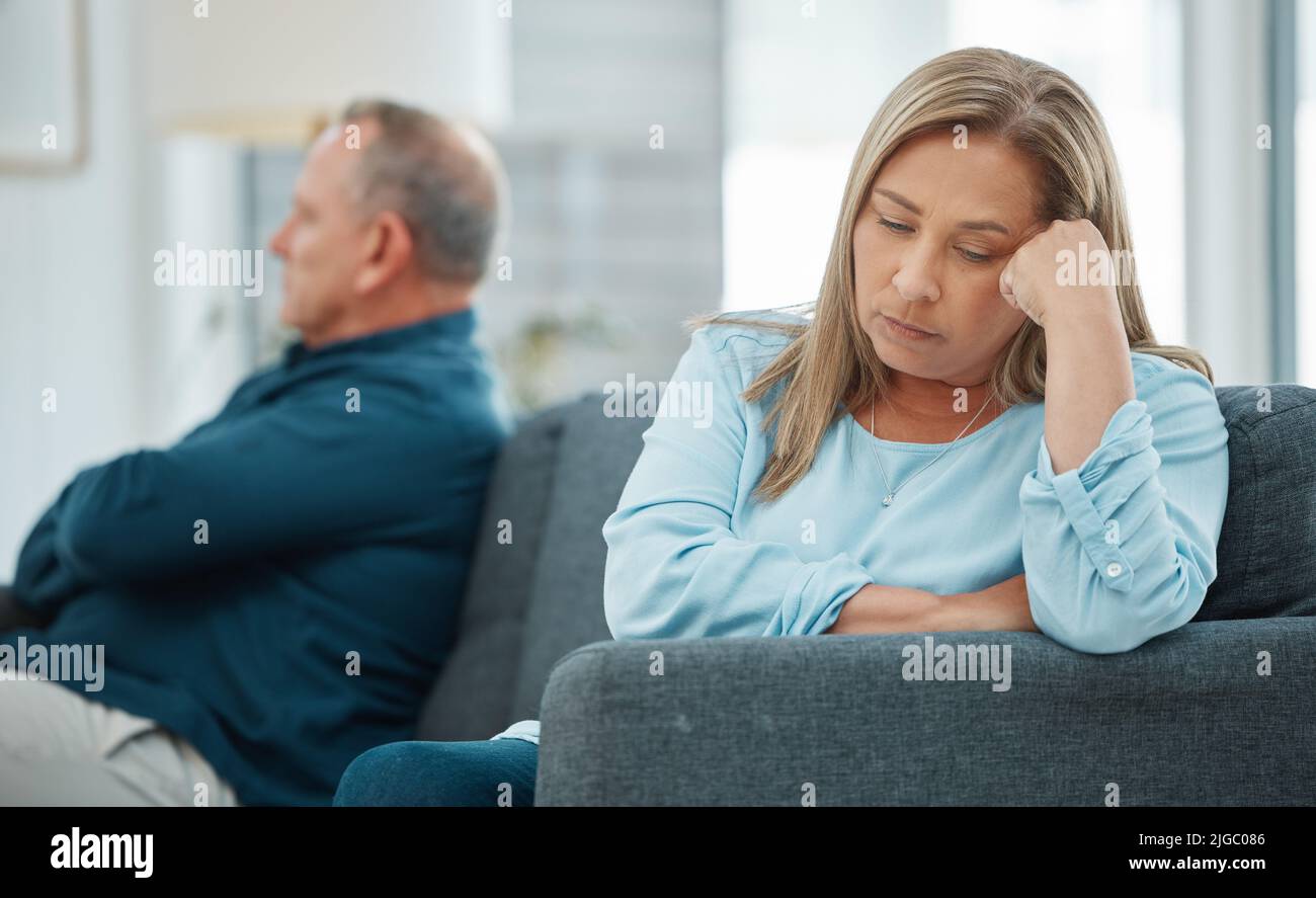 Heartbreak feels painful today. a mature couple fighting Stock Photo ...