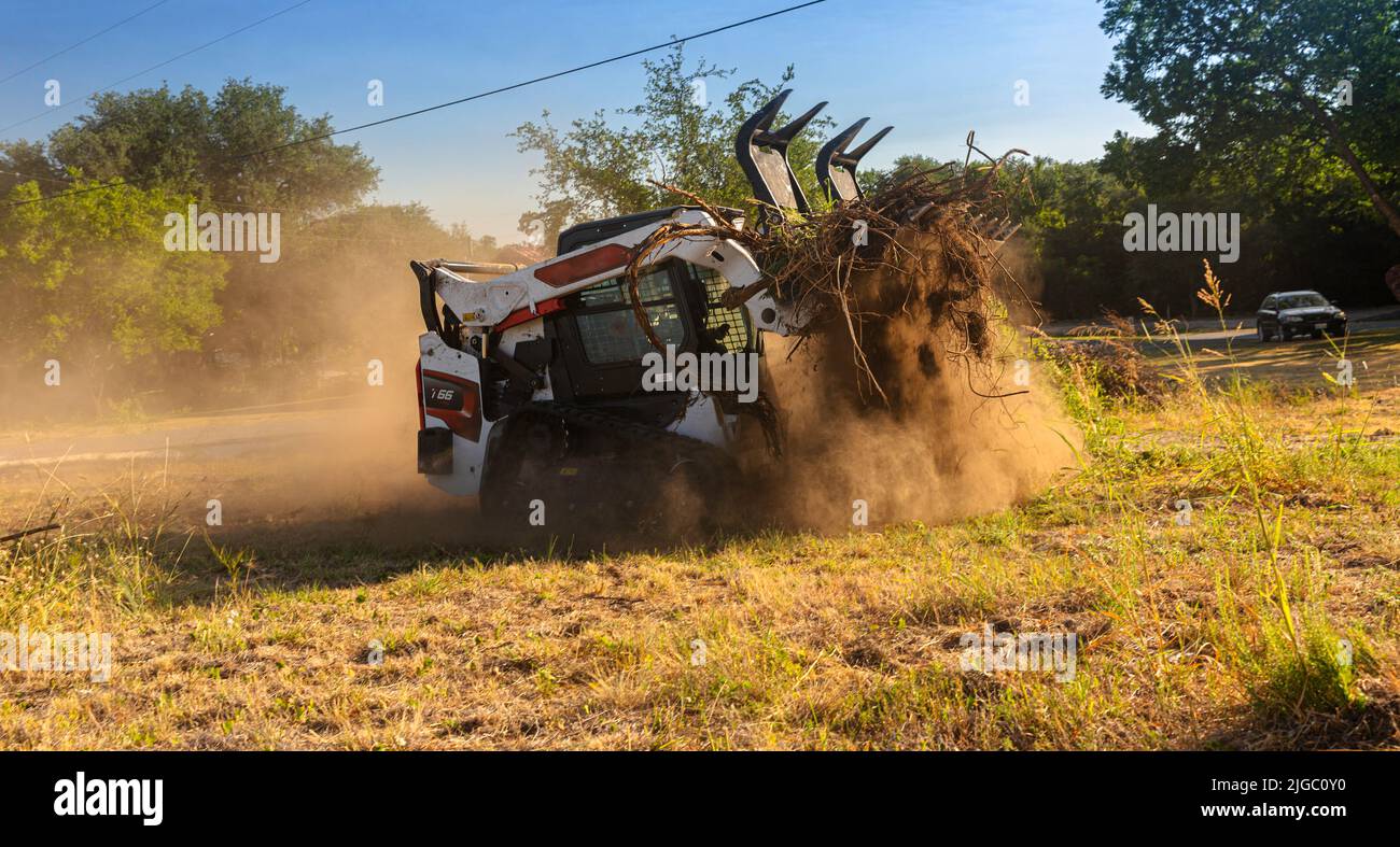 excavator machine in action and Moving Fast Stock Photo - Alamy