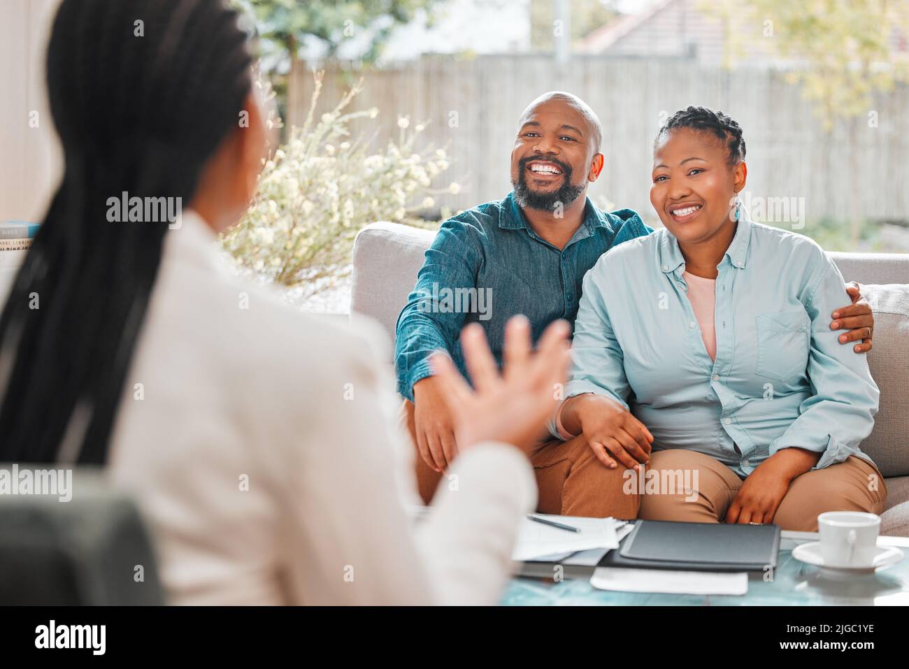 The best weve ever seen. a mature couple meeting with their insurance ...