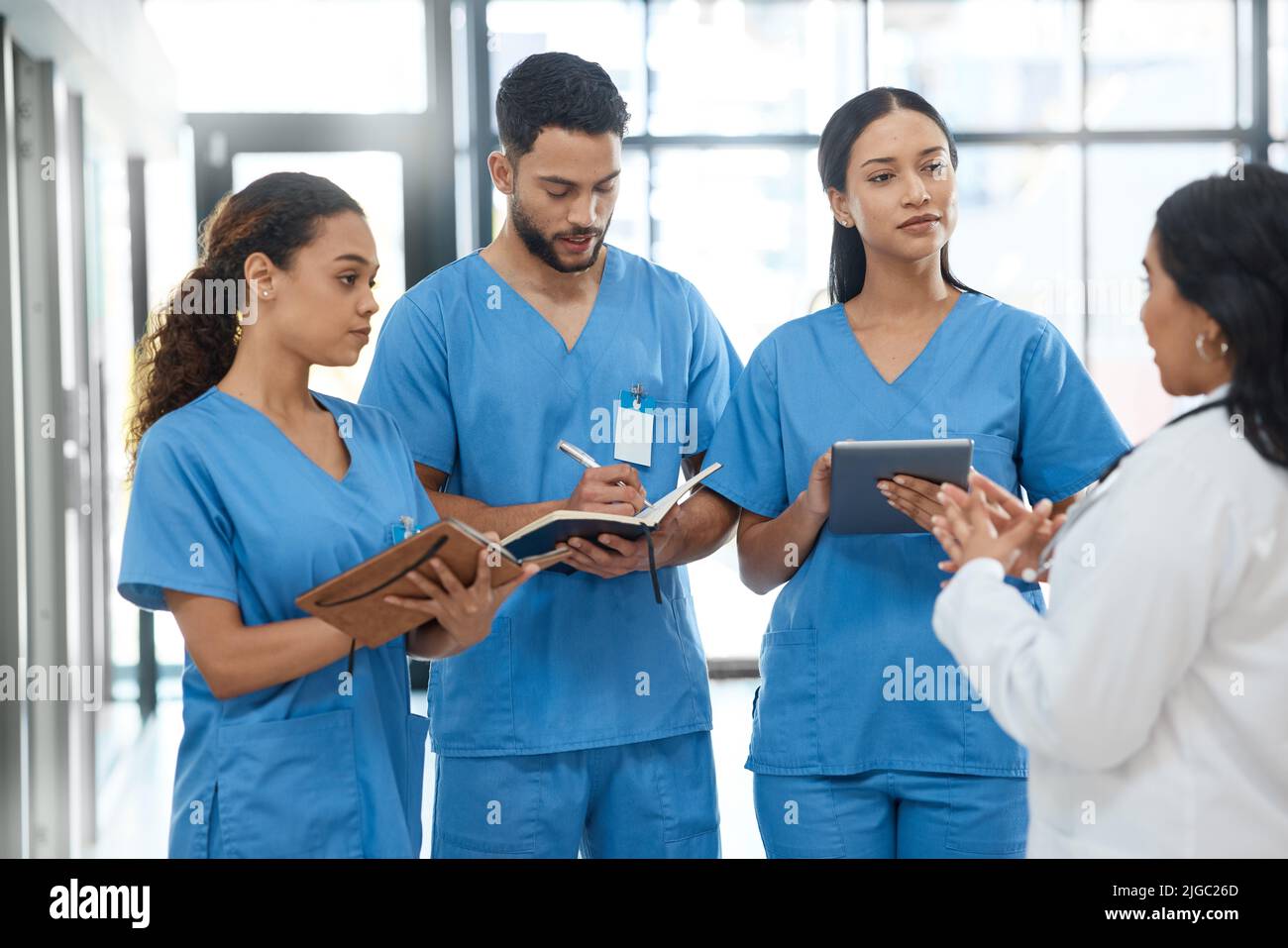 Coming together as the top in their field. a group of medical ...