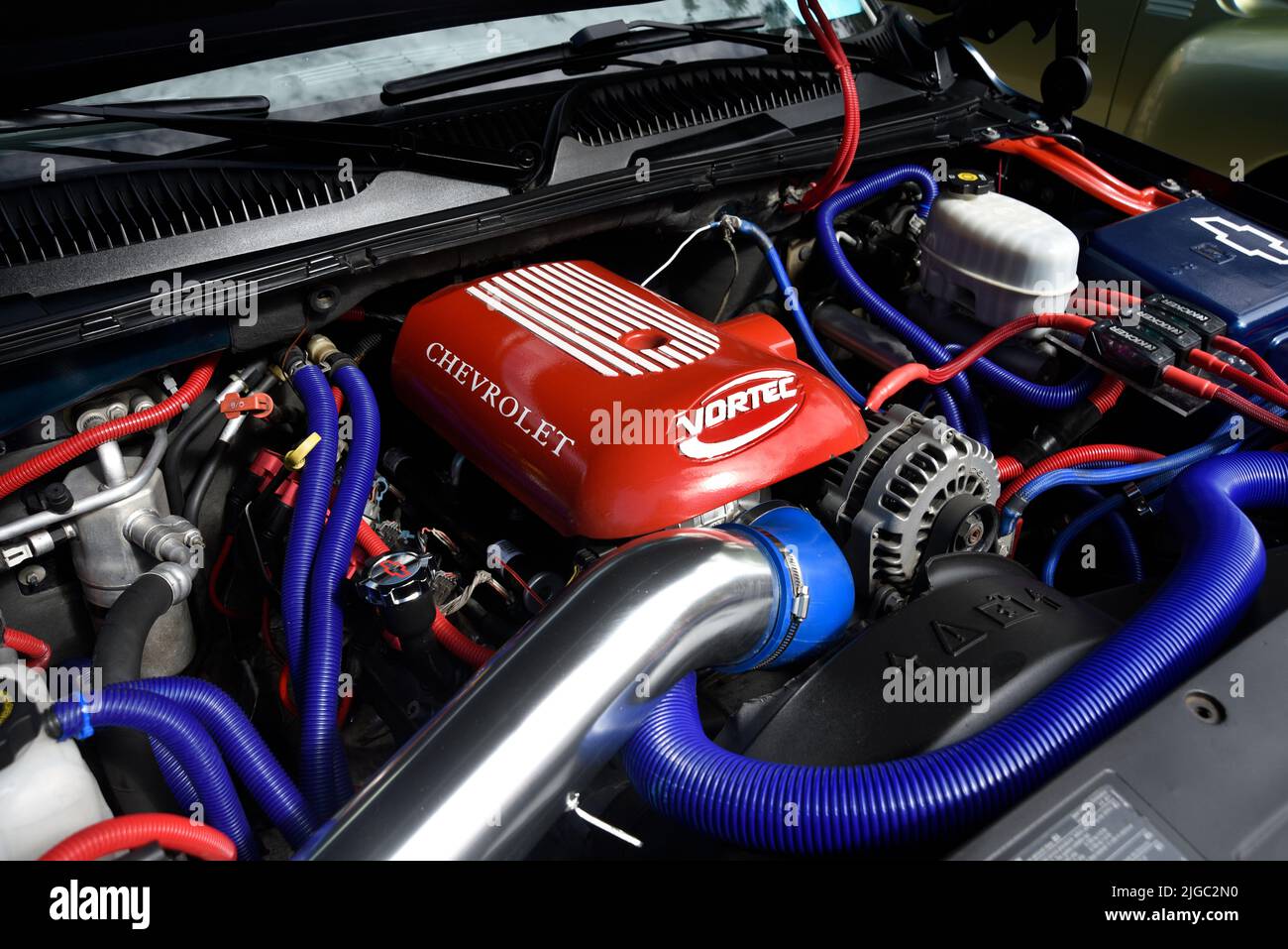 A Chevrolet Vortec gas engine in a General Motors truck on display at a ...