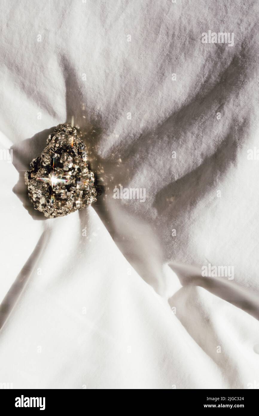 sparkling pyrite, fool's gold crystal geode rock on white Stock Photo ...