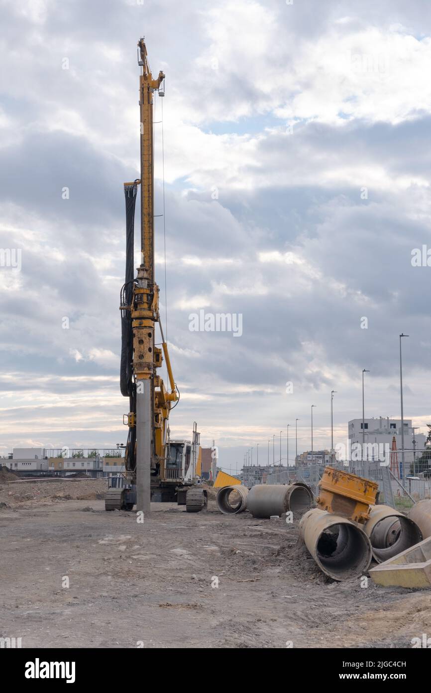 Large Land drilling machine on Building site. preparing the foundation ...