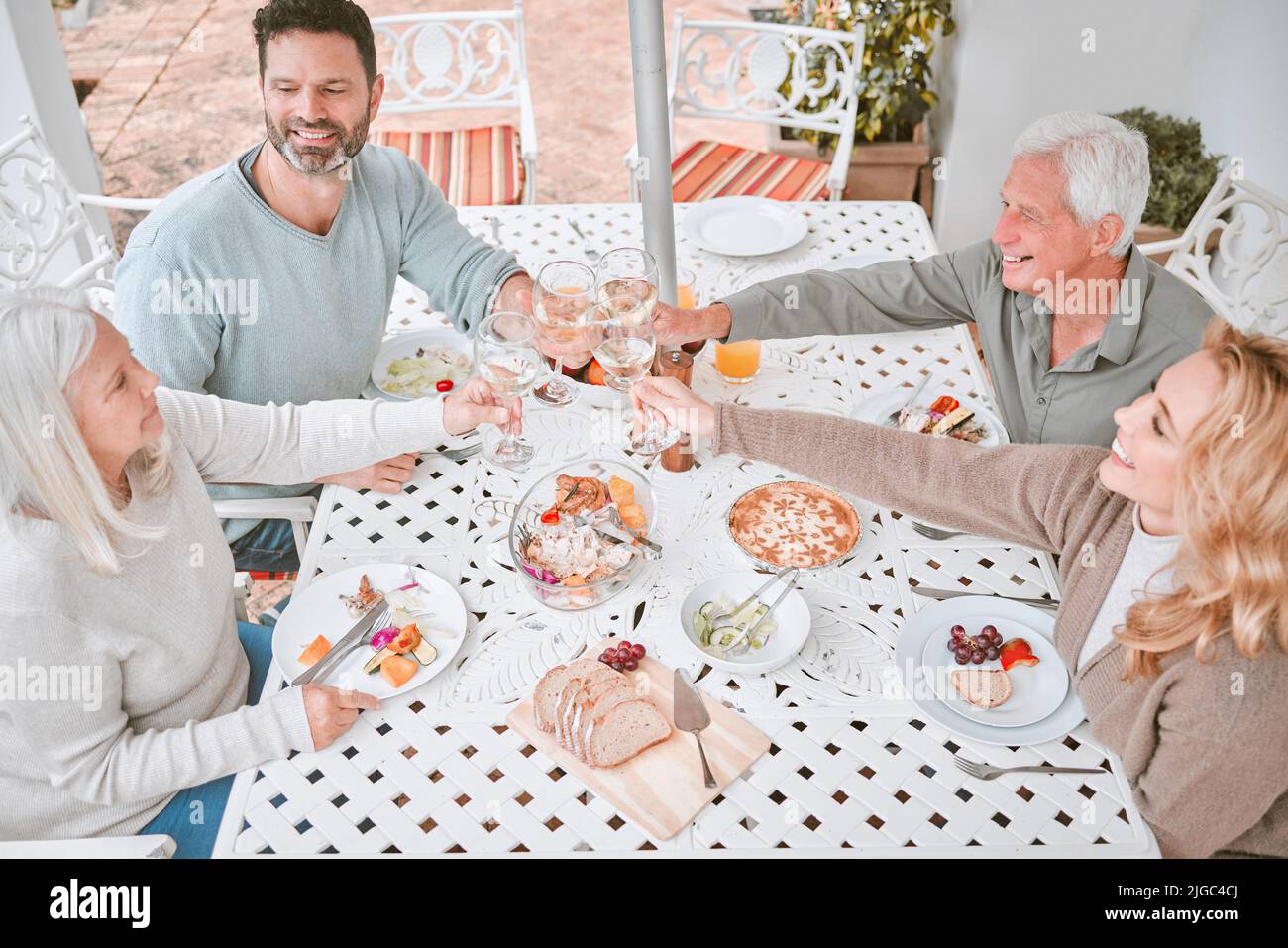 Family is the most important thing in the world. a family toasting with ...