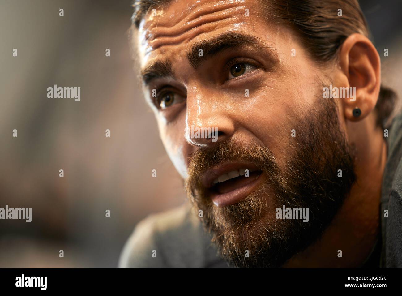 If it was easy, then it wouldnt work. a sporty young man catching his ...