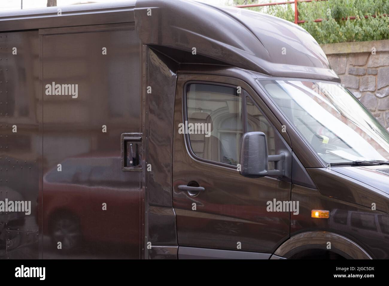 Parcel delivering Service car parked on the street in EU Stock Photo ...