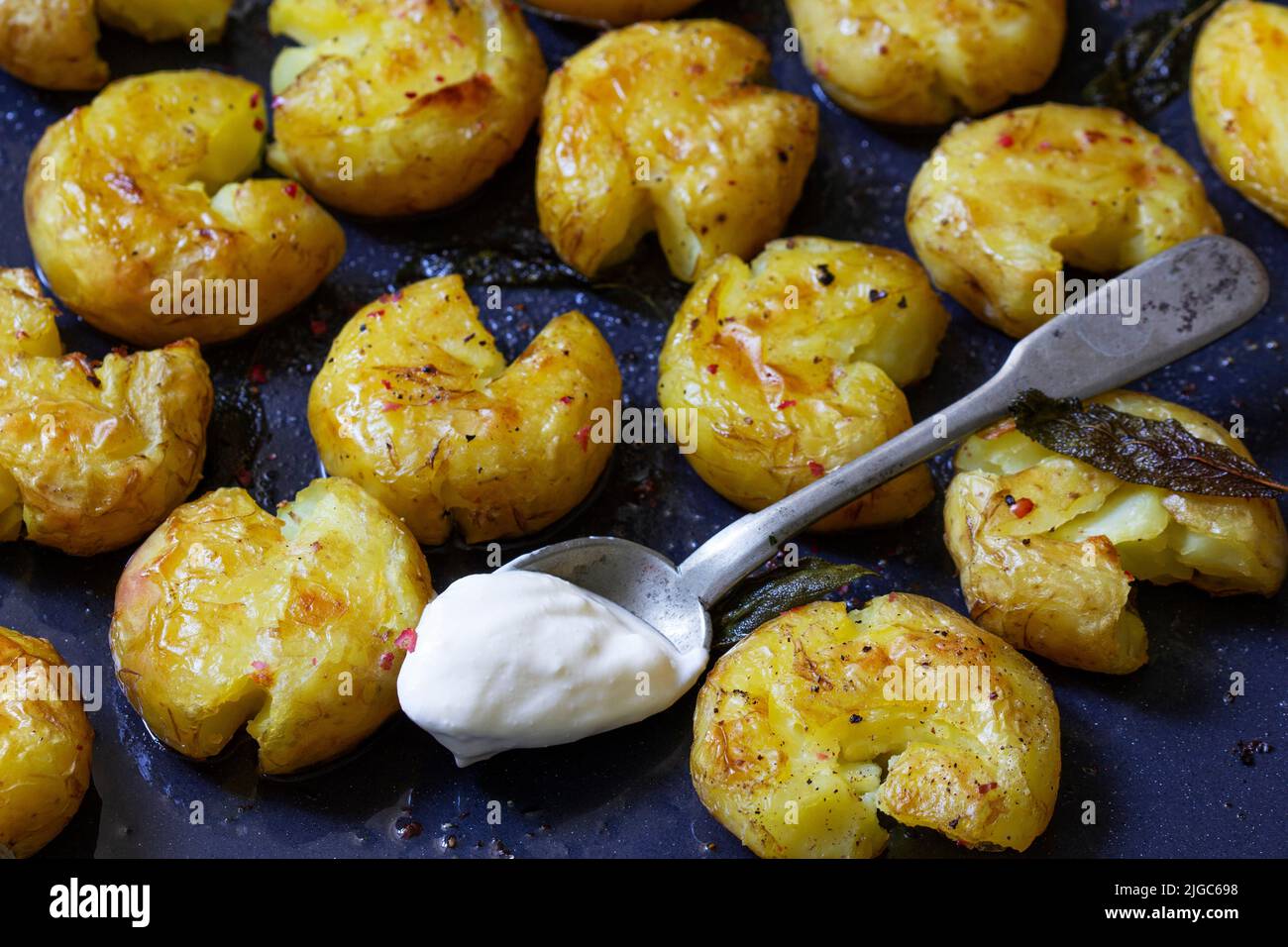 Crispy baked potatoes in country hi-res stock photography and images ...