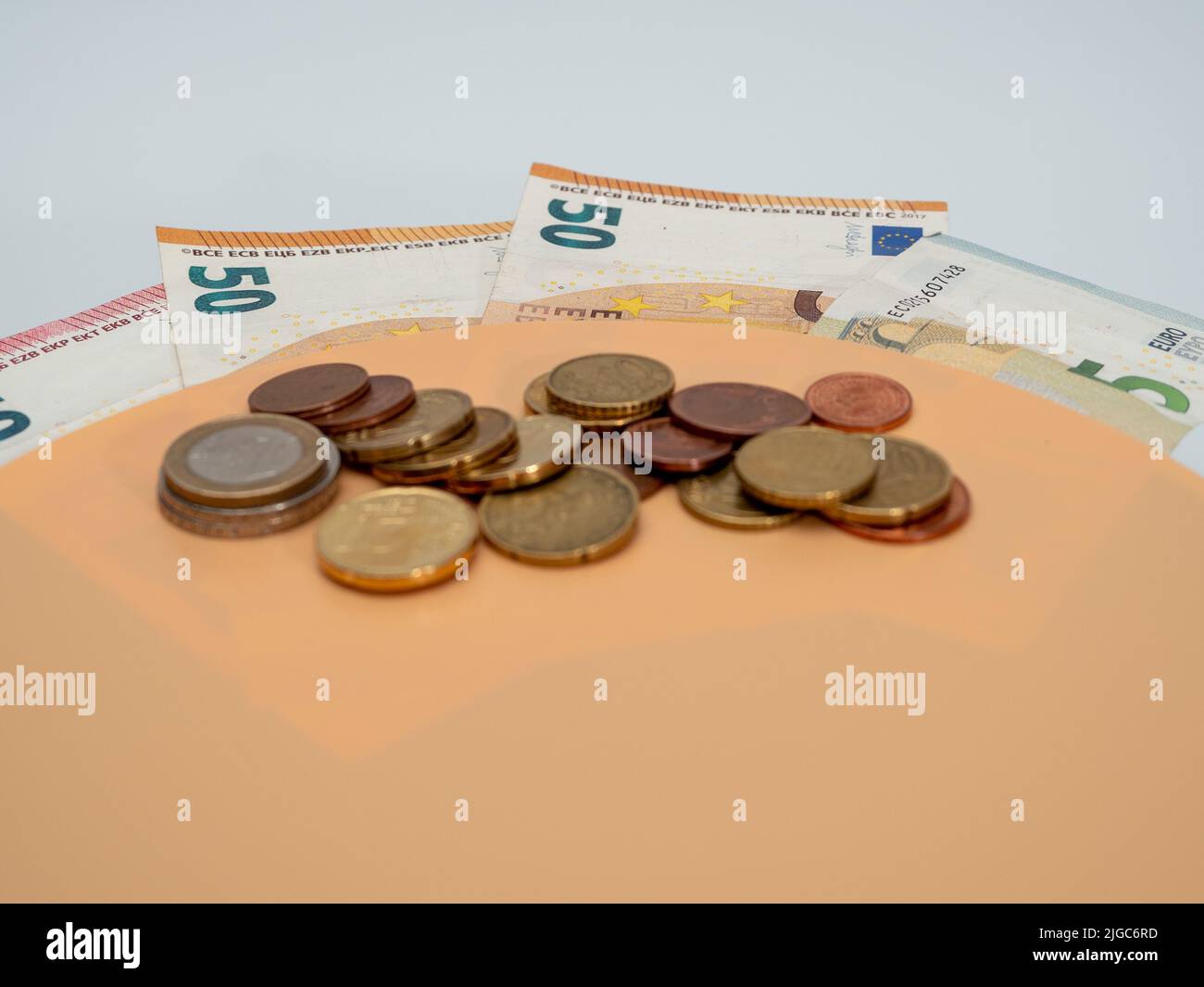 Euro bills and coins. Cash. The concept of savings Stock Photo - Alamy