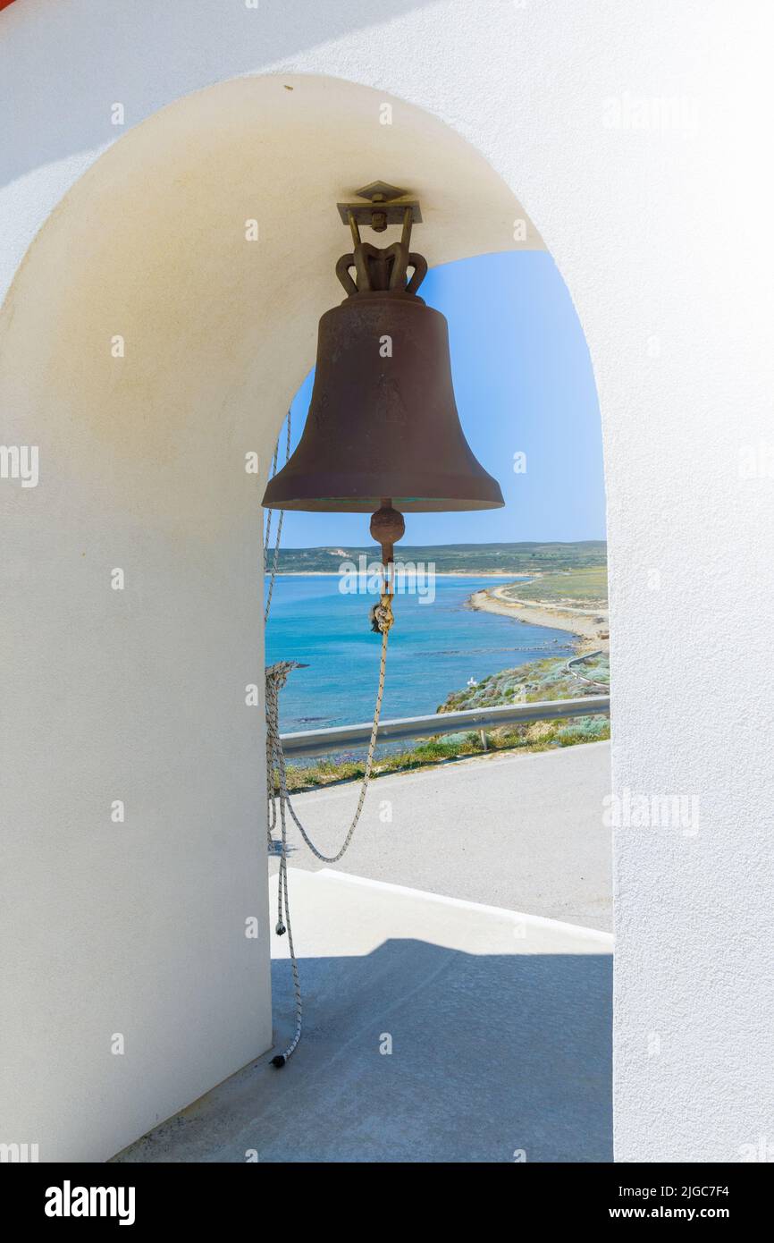 Bell in a belfry with the blue sea as a background Stock Photo - Alamy