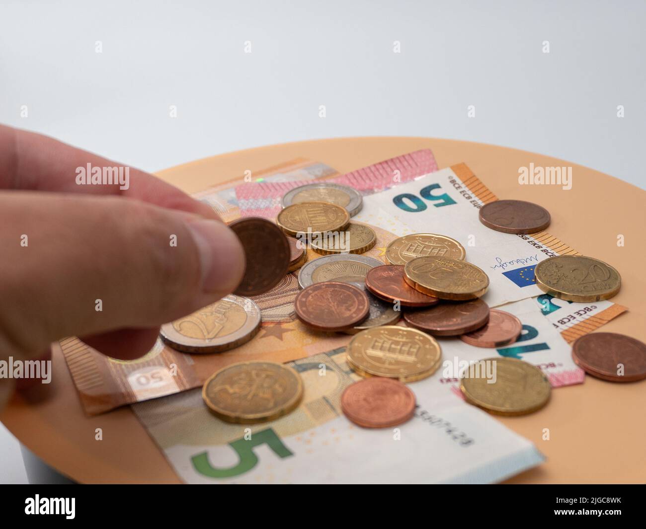 Euro bills and coins. Cash. The concept of savings Stock Photo - Alamy