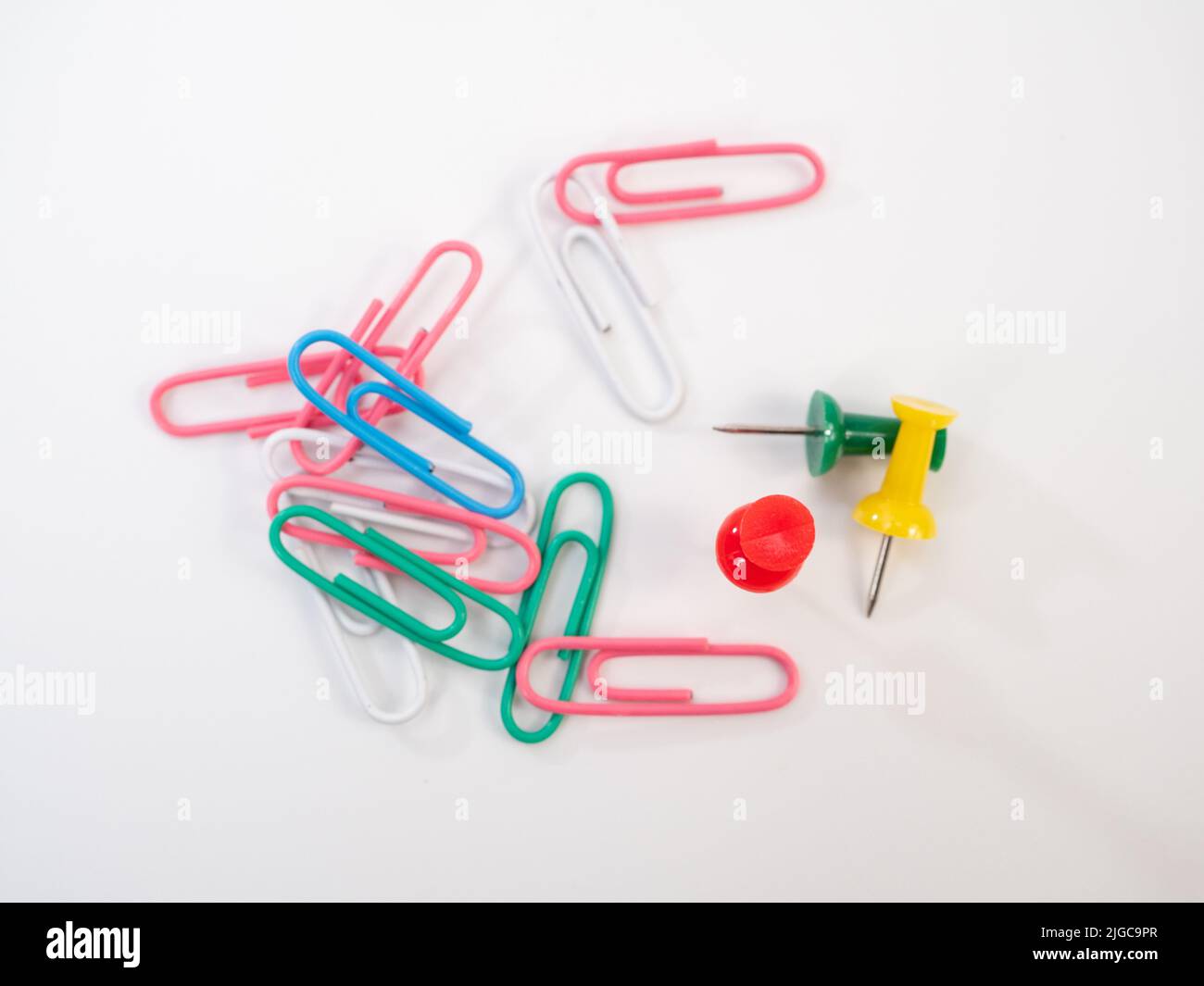 Set of colored paper clips and thumbtacks. Buttons and paperclips Stock ...