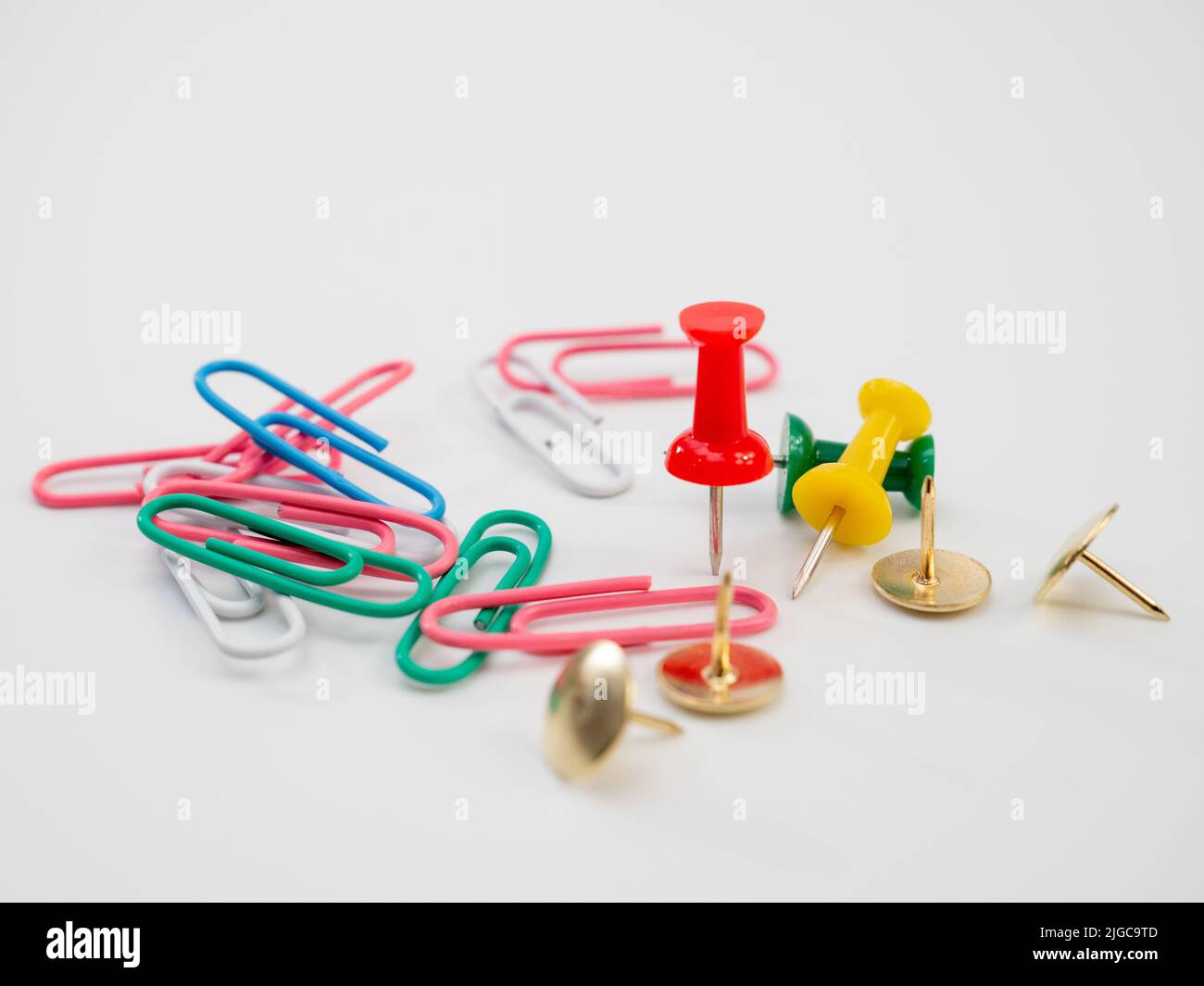 Set of colored paper clips and thumbtacks. Buttons and paperclips Stock ...