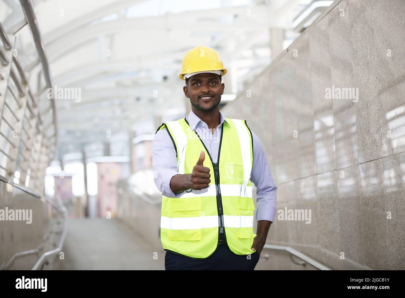 Architect, civil engineer and worker looking at plans and blueprints ...