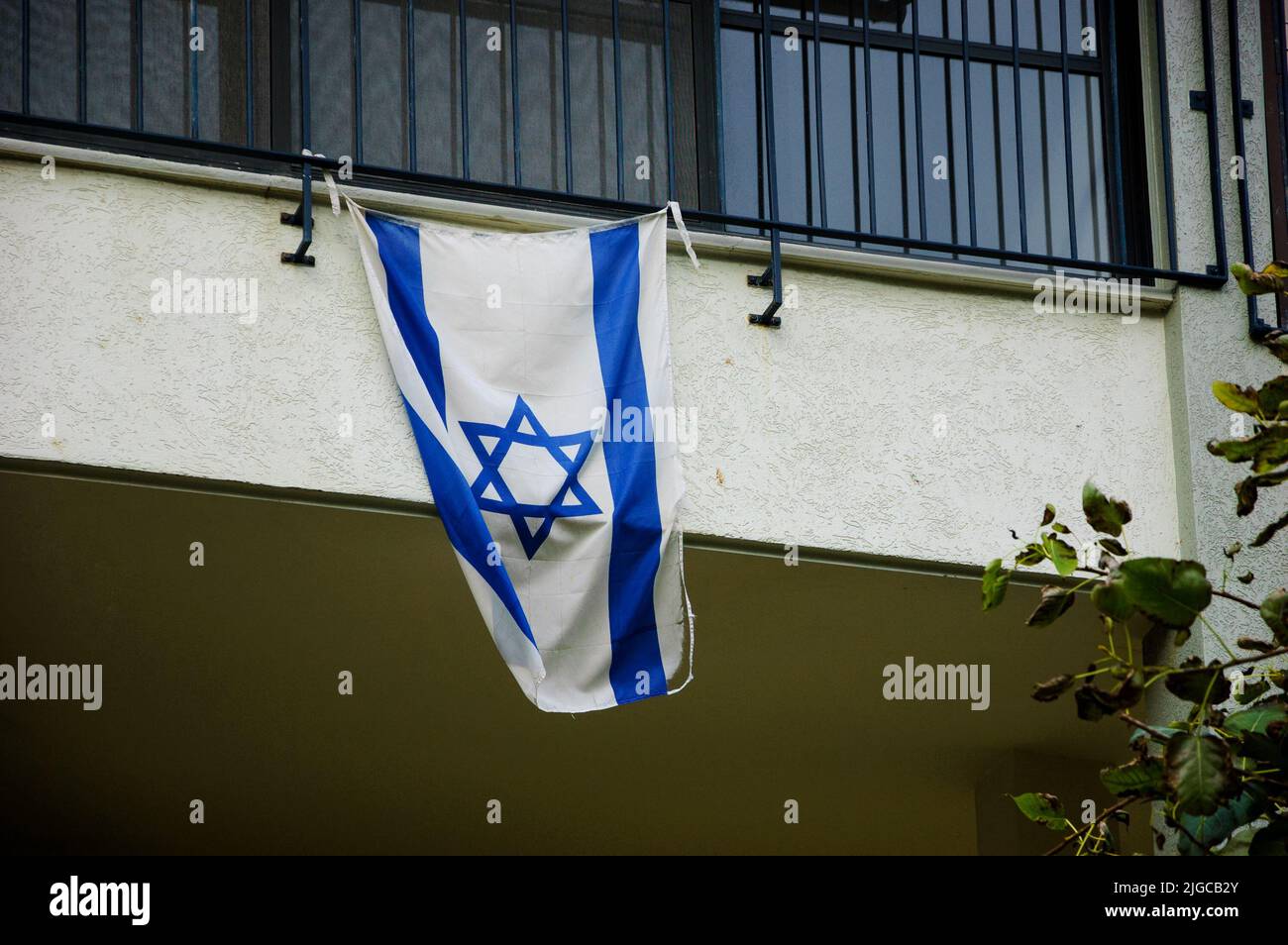 Israeli flag hanging on typical building in Tel Aviv, Israel Stock ...