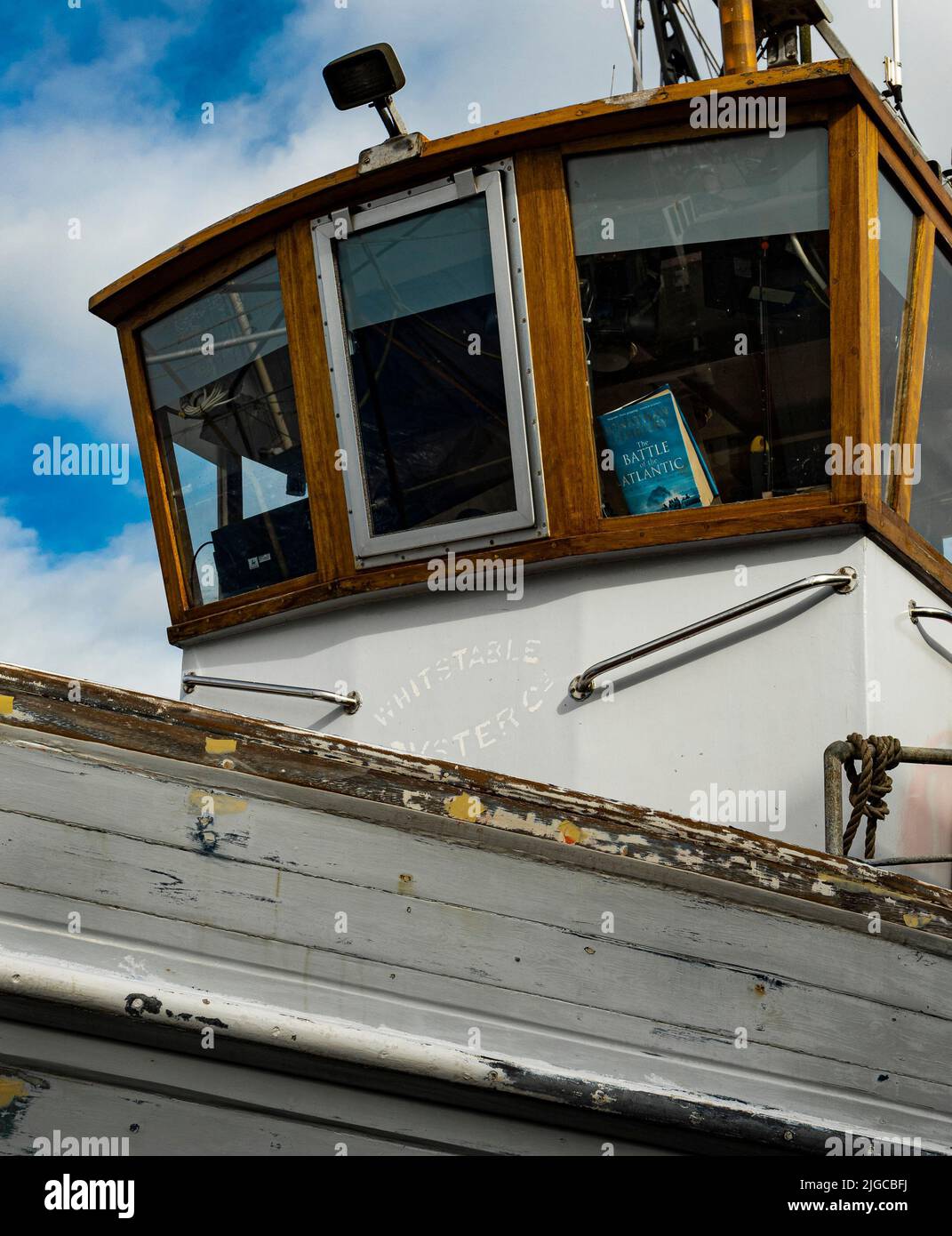 A closeup of detail of wheelhouse aboard veteran vessel undergoing work ...