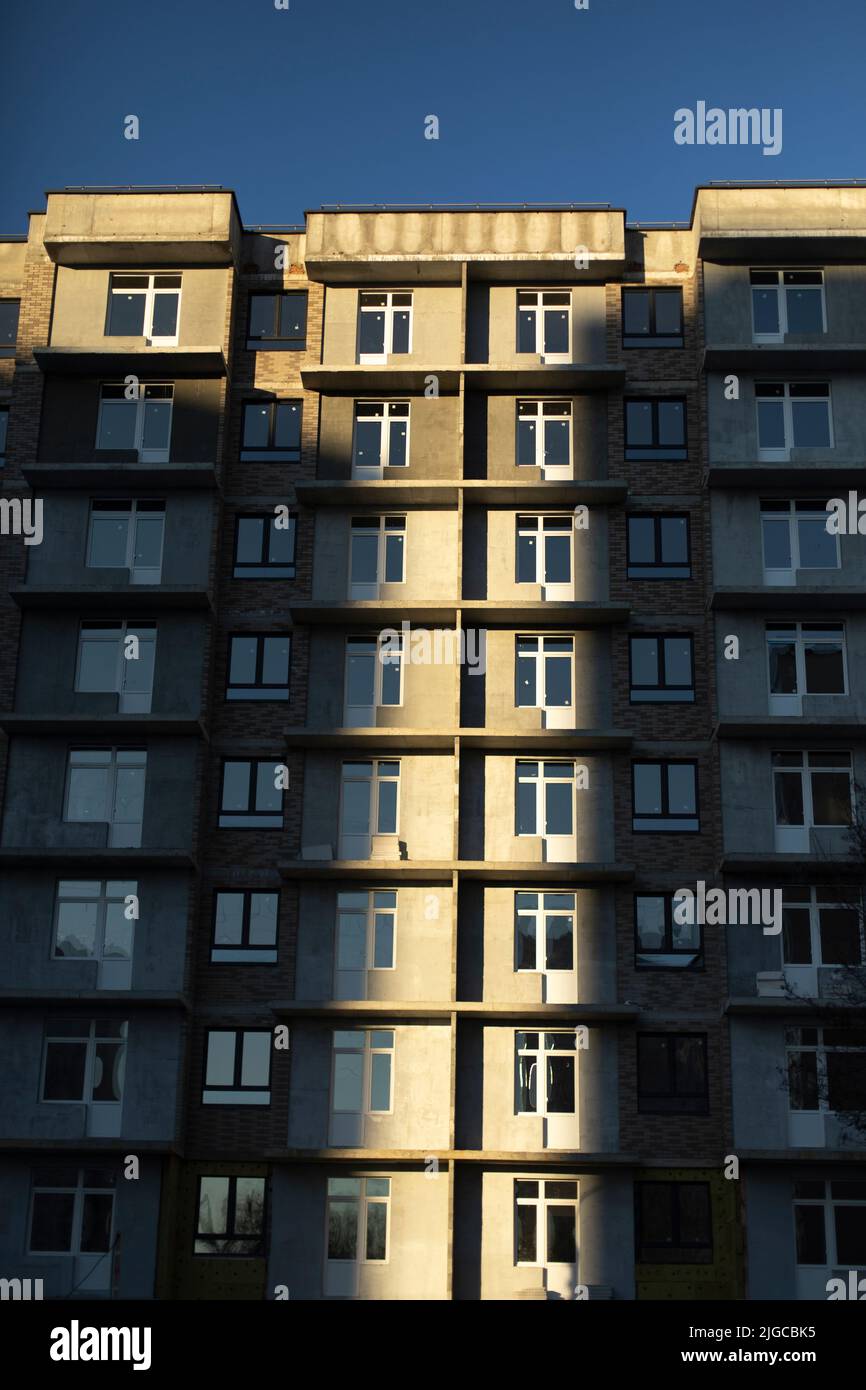 Building with windows. Urban development. Lots of apartment building ...